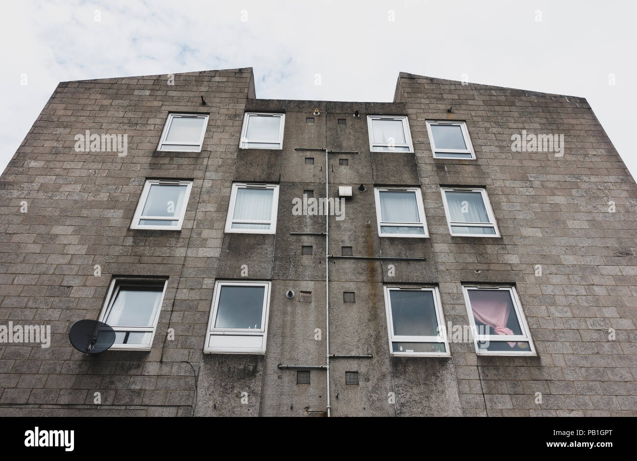 Exterior of ugly concrete apartment building Carnegie Court in ...