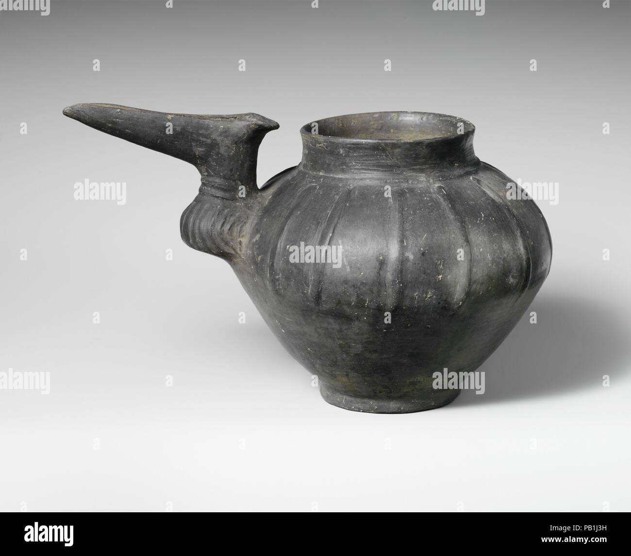 Spouted pitcher. Culture: Iran. Dimensions: H. 8 3/4 in. (22.2 cm ...