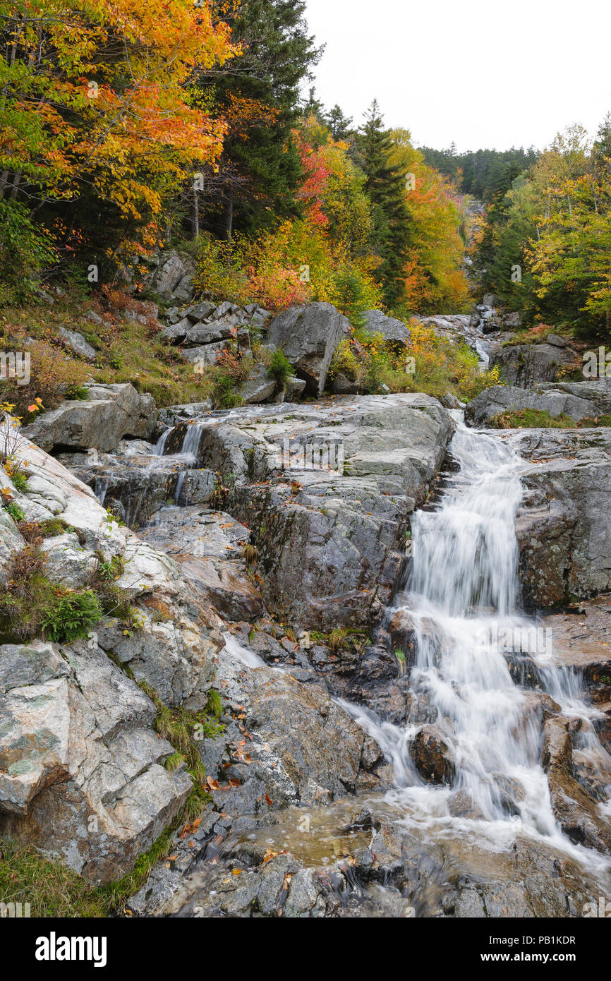 Flume Cascade in Hart’s Location, New Hampshire during autumn months ...