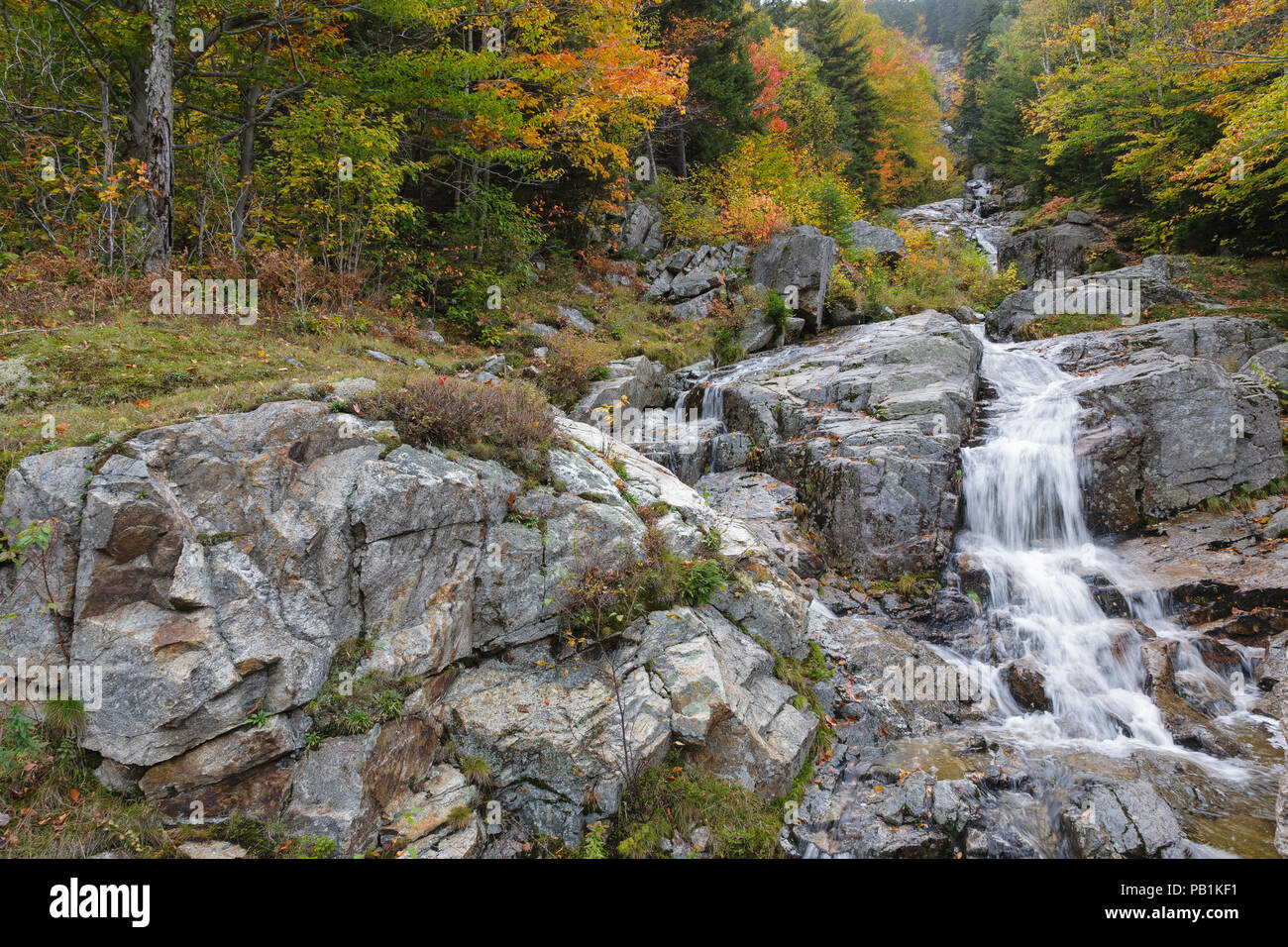 Flume Cascade in Hart’s Location, New Hampshire during autumn months ...