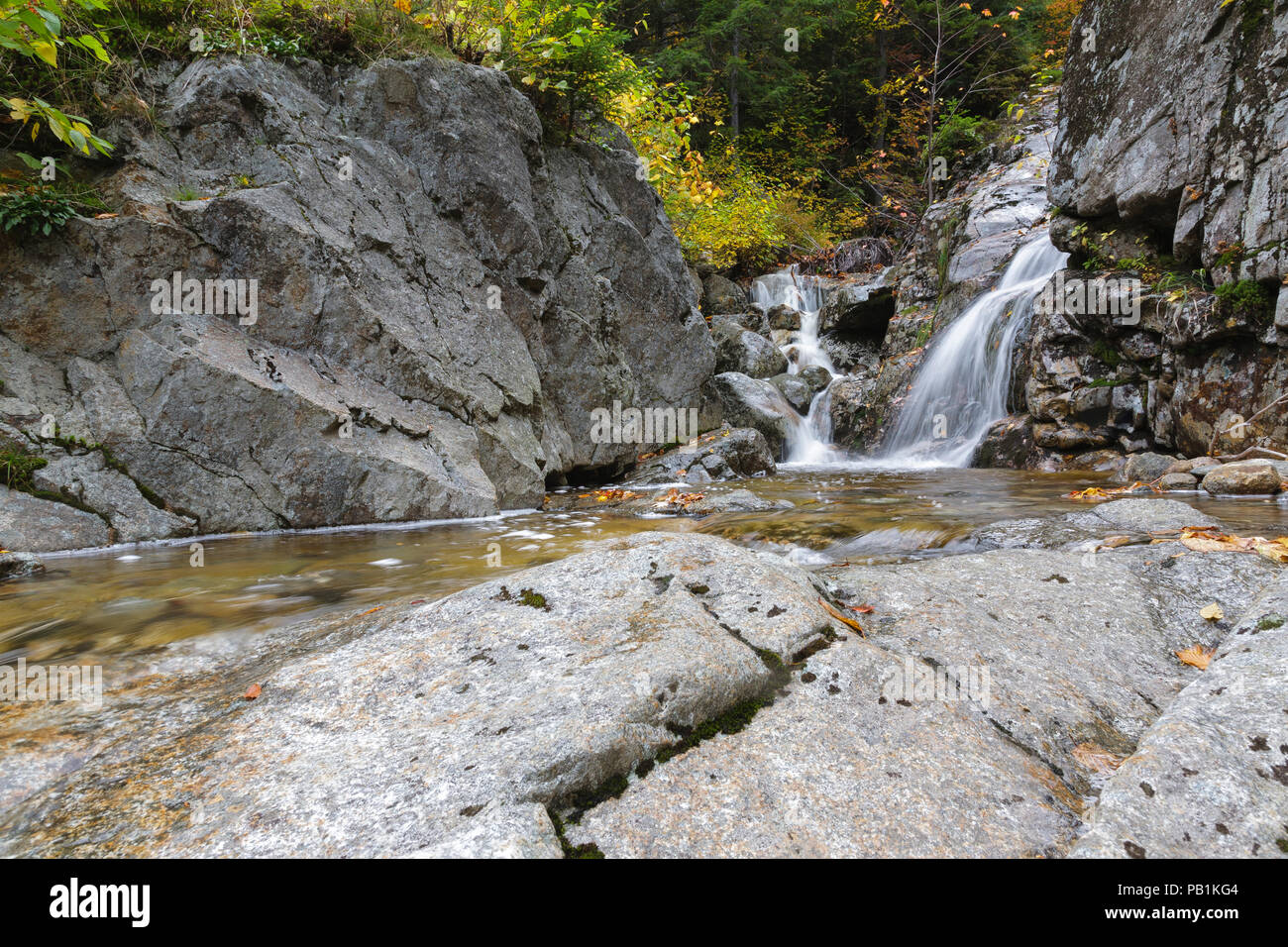 Flume Cascade in Hart’s Location, New Hampshire during autumn months ...