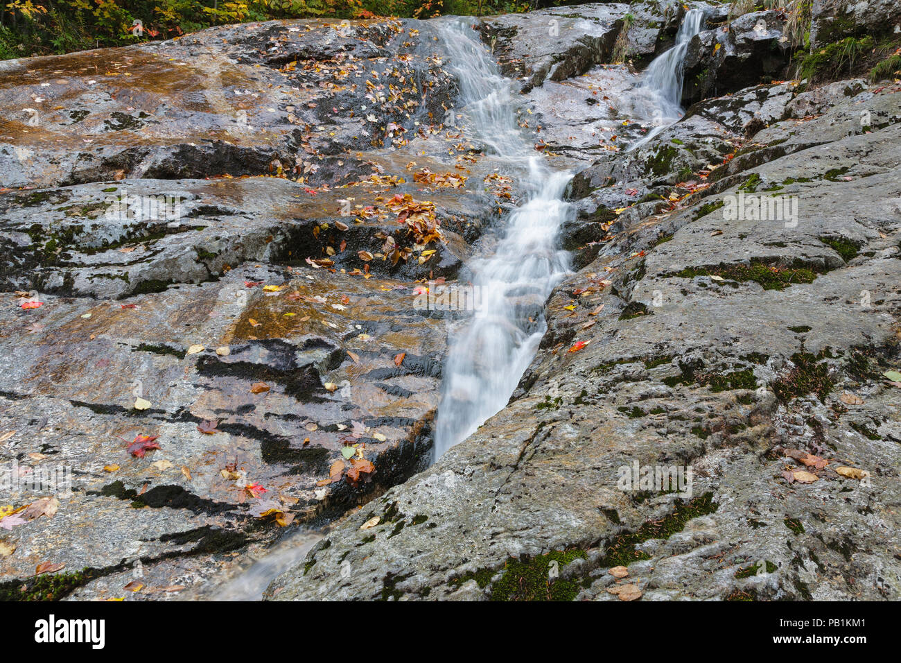 Flume Cascade in Hart’s Location, New Hampshire during autumn months ...
