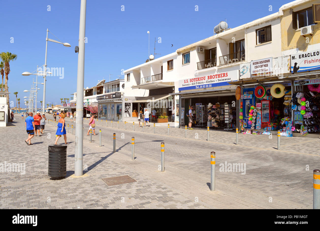 Tourists shopping in Paphos harbour, Cyprus Stock Photo - Alamy