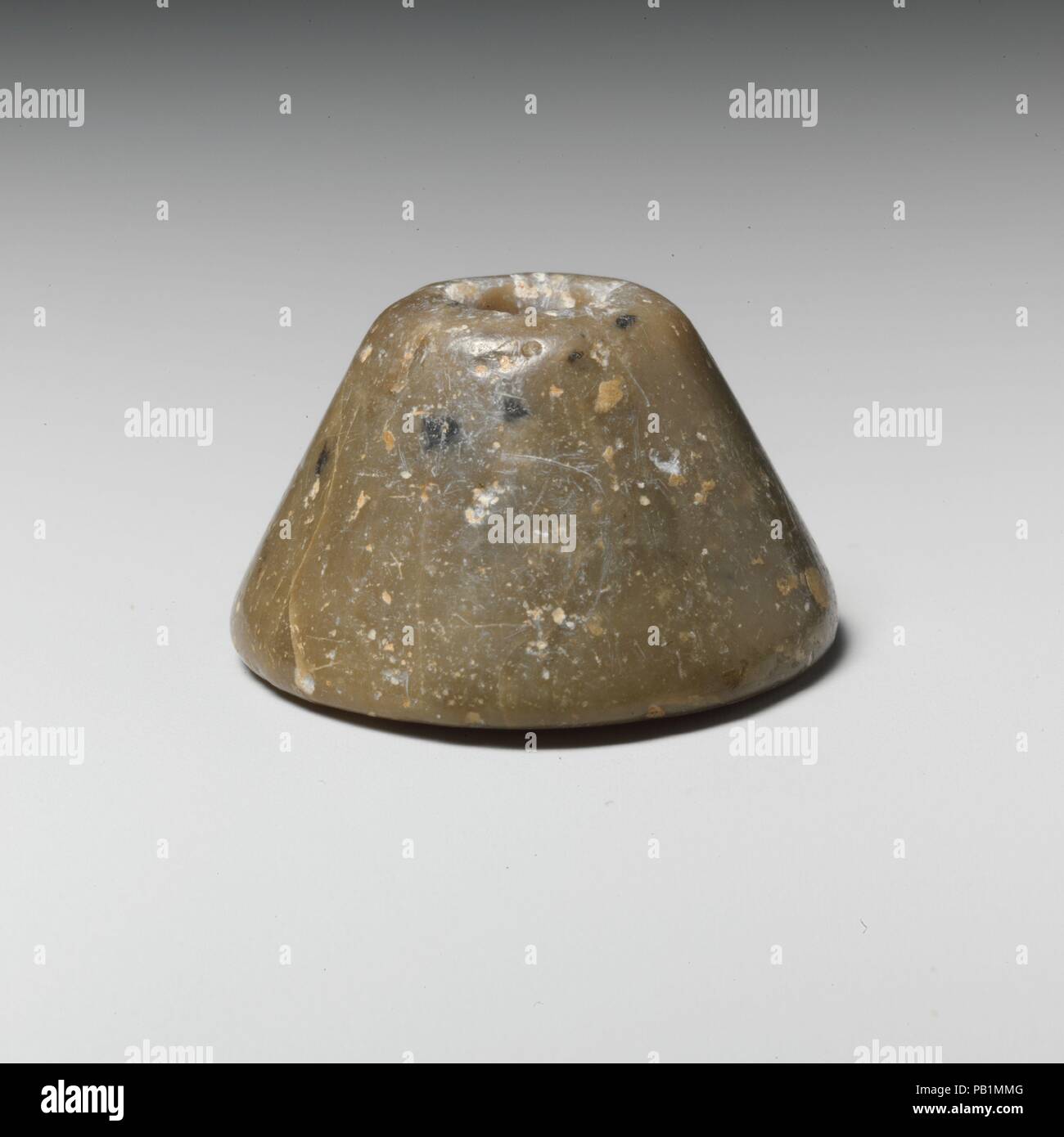 Stone spindle whorl. Culture: Minoan. Dimensions: Diameter 7/8 in. (2.1 ...