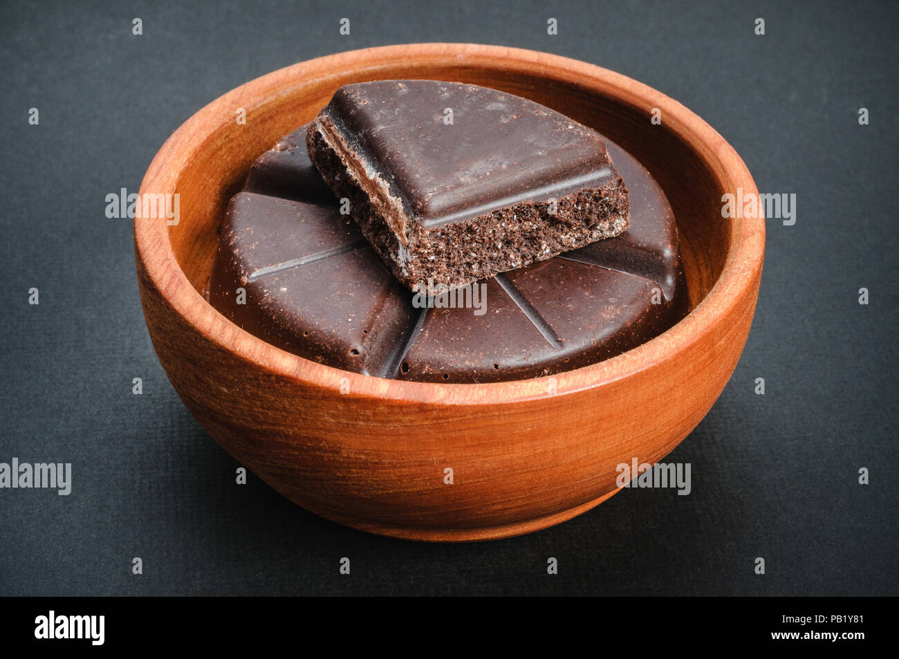 Traditional mexican chocolate bar in wooden bowl isolated top view ...