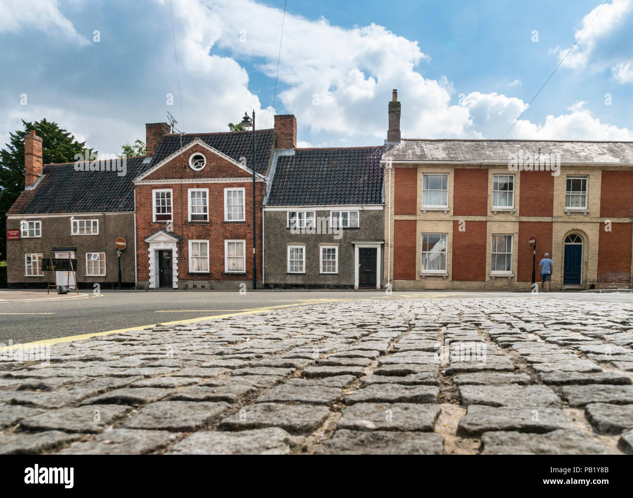 View of a cobbled road and historic houses in Old Market, Beccles ...