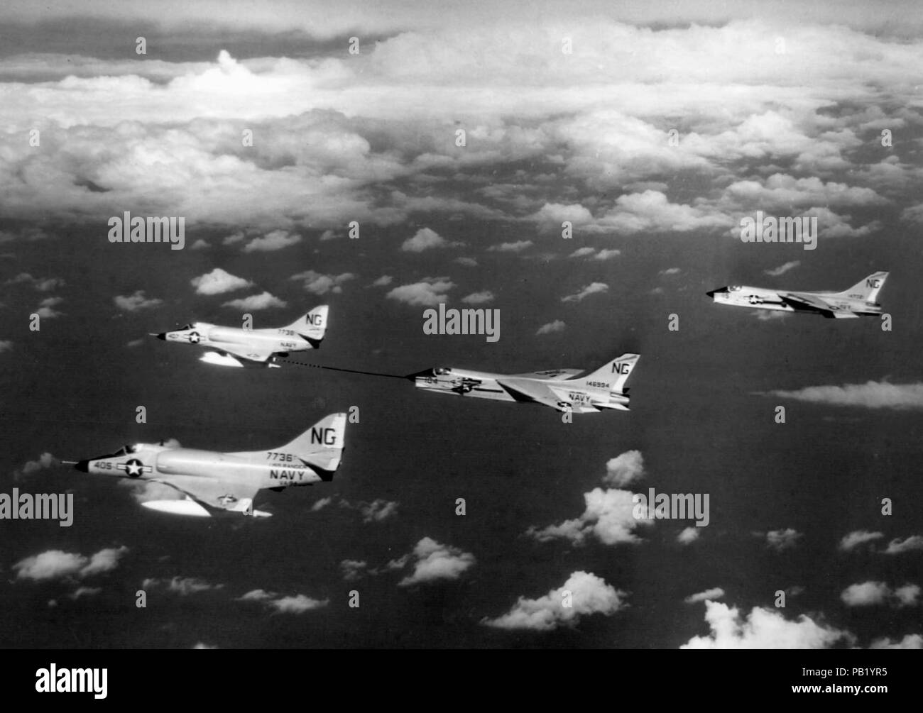 A-4Cs VA-94 refueling F-8Cs VF-91 Stock Photo - Alamy