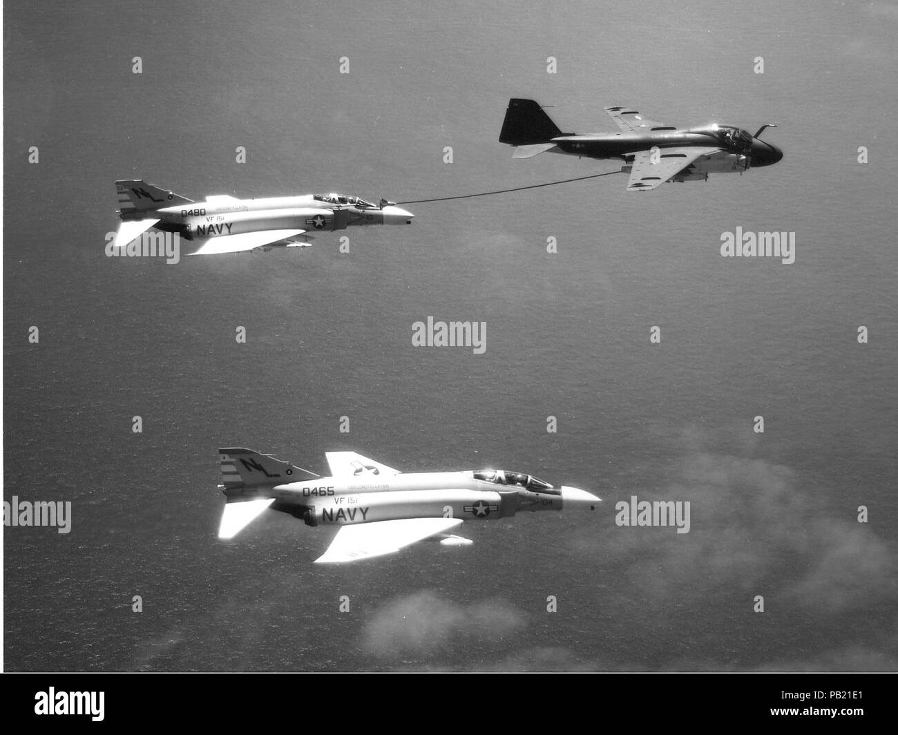 A-6A of VA-65 refuels two VF-151 F-4Bs over Gulf of Tonkin 1966 Stock ...