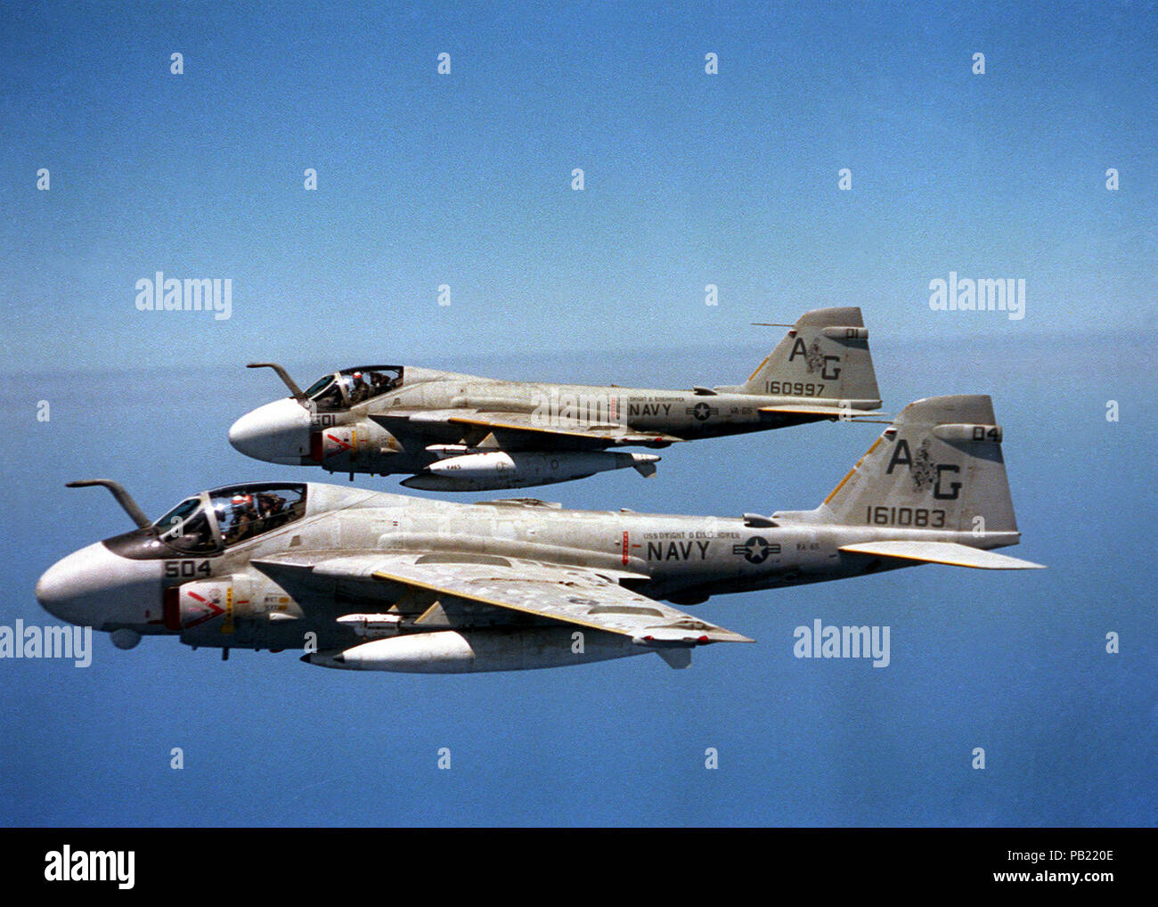 A-6Es VA-65 CVN-69 1987. An air-to-air left side view of two Attack ...