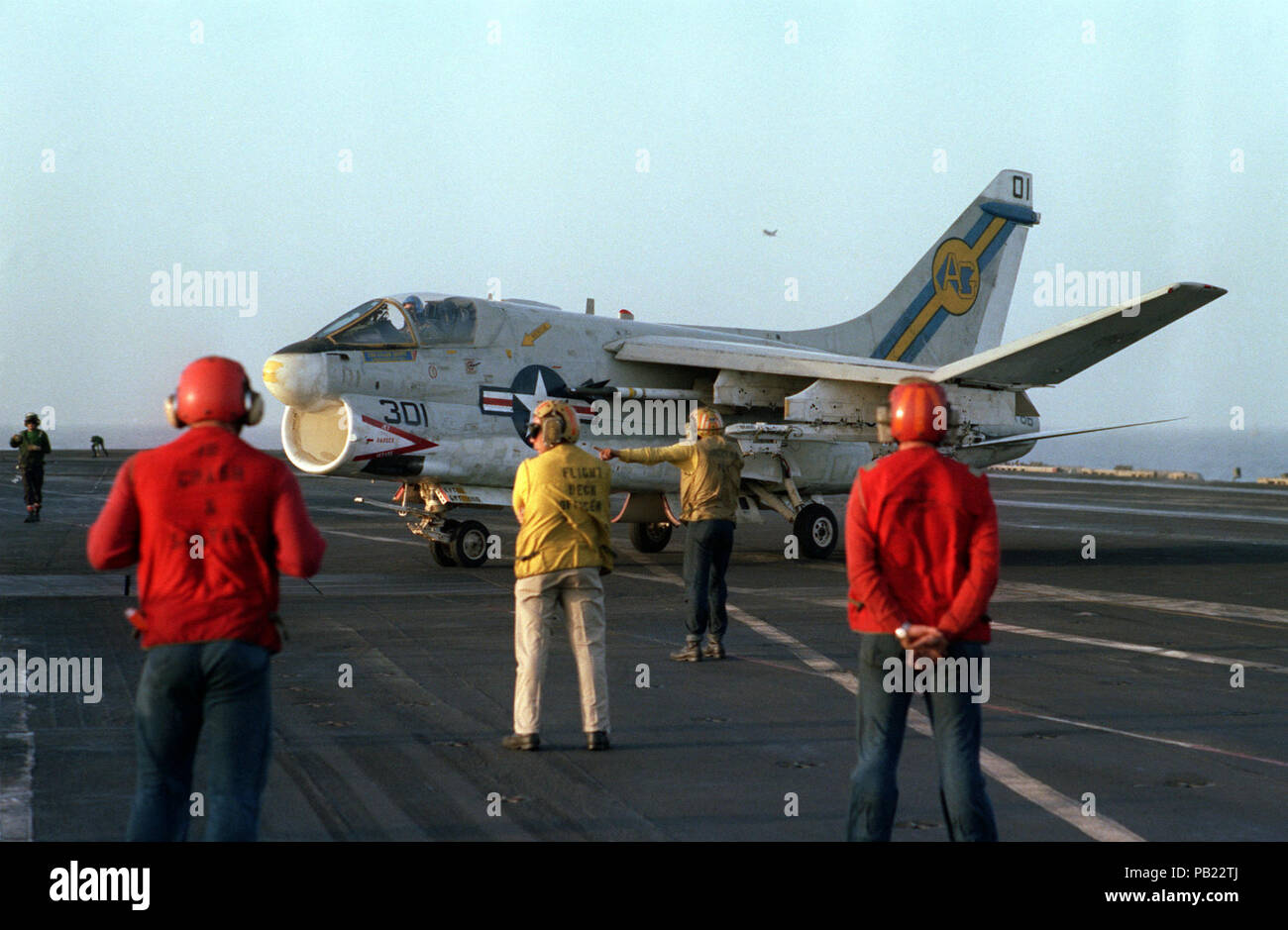 A-7E VA-66 after landing on USS Eisenhower 1980. A plane director ...