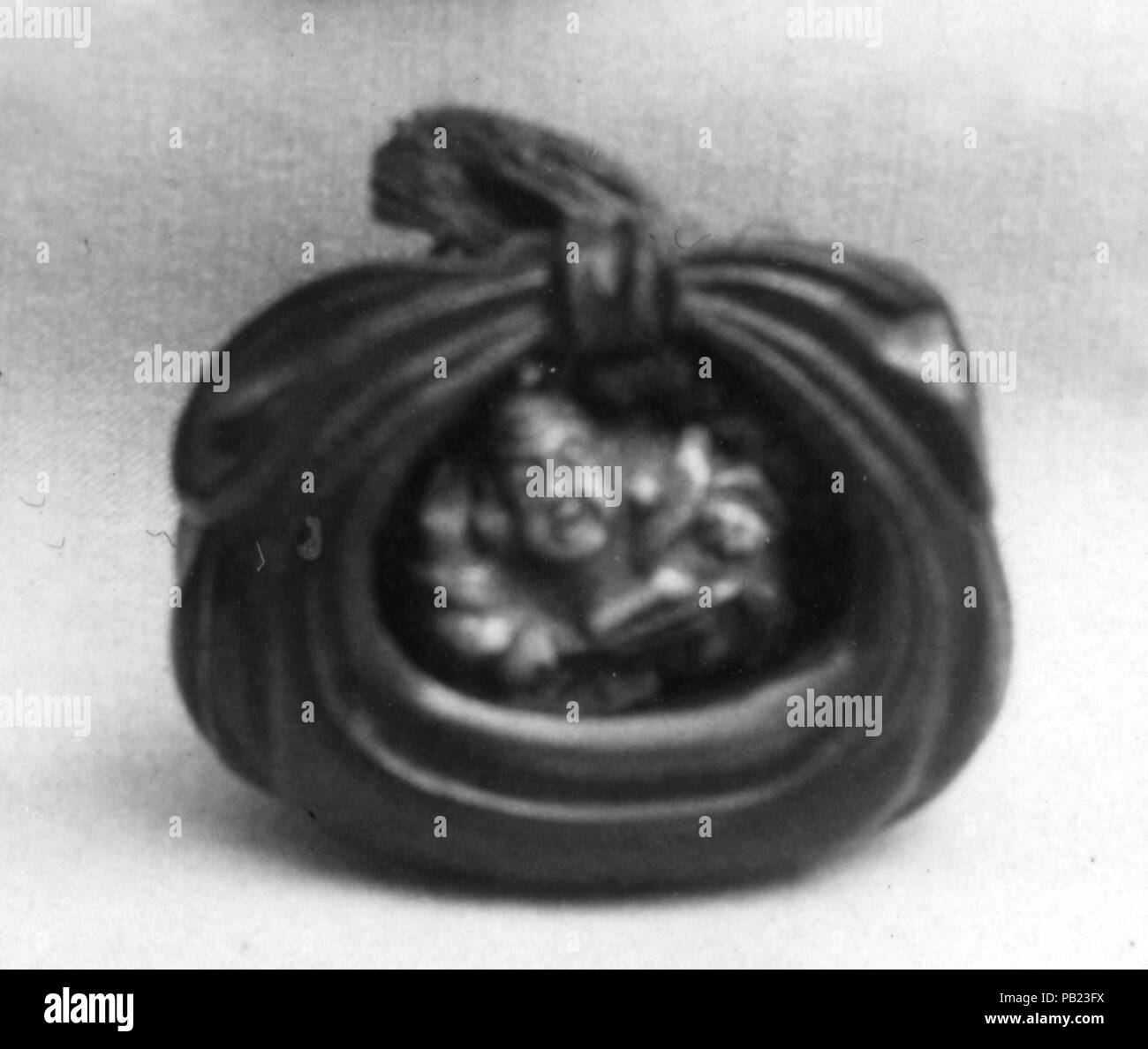 Netsuke of Bag Containing a Figure of Hotei. Culture: Japan. Dimensions ...