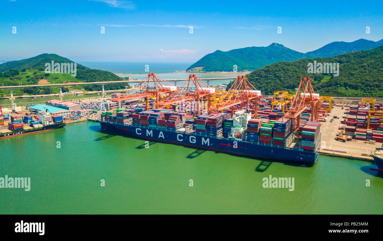 Aerial view of Busan new port of South Korea. Container ship in import ...