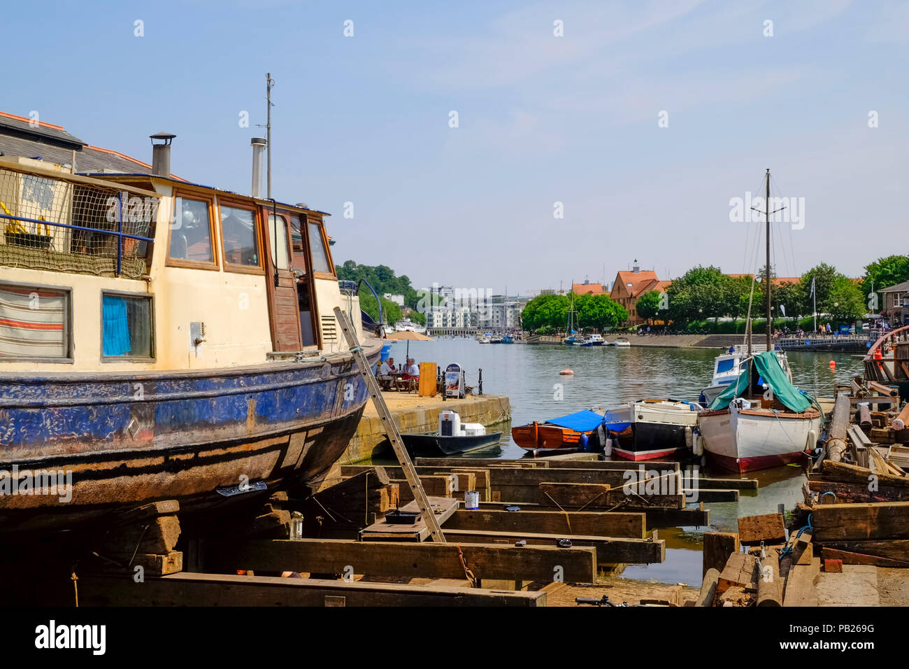 Bristol Harbour, repairing a boat at the underfall yard, a working ...