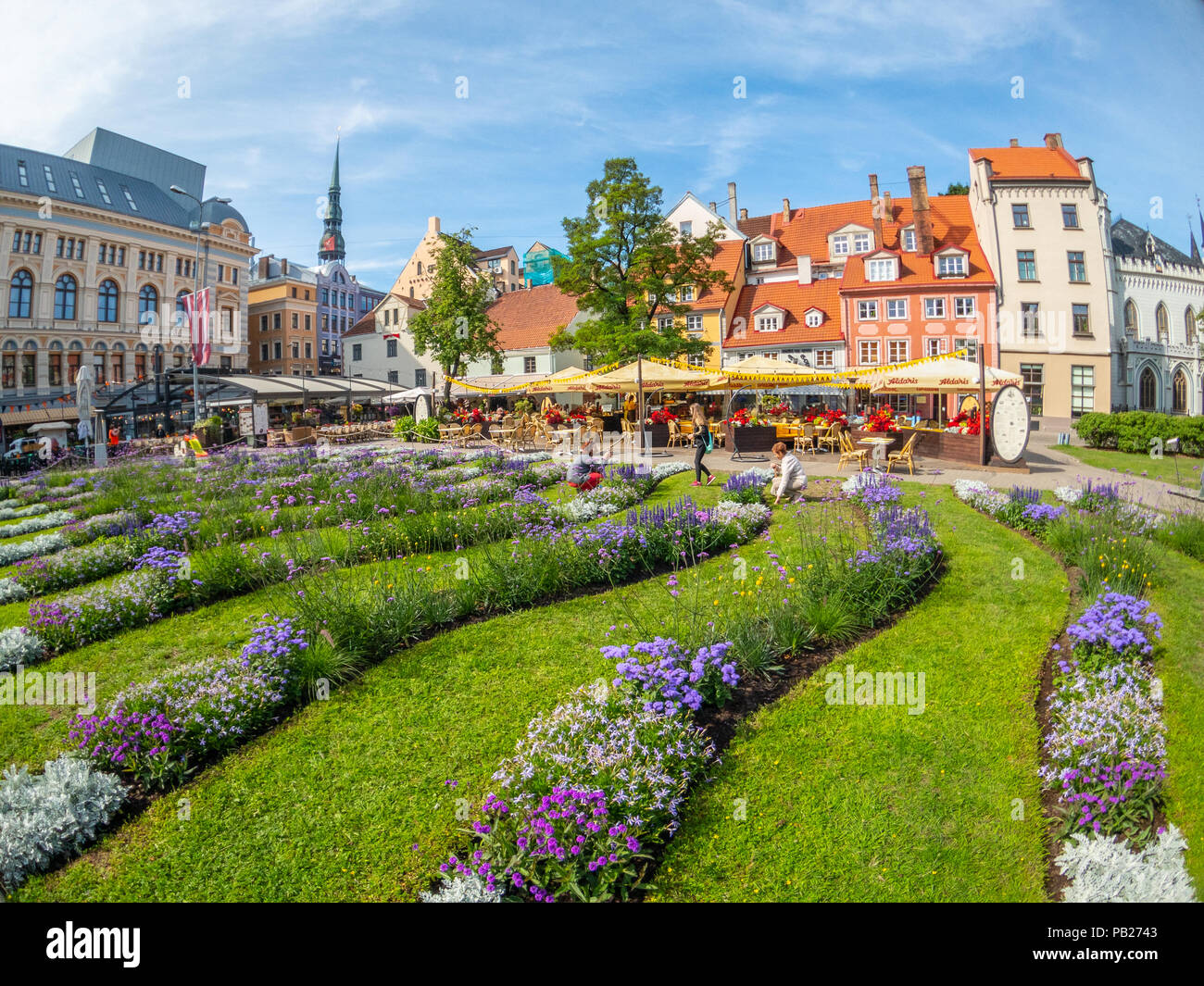 People visit old city center at day time in summer Stock Photo - Alamy