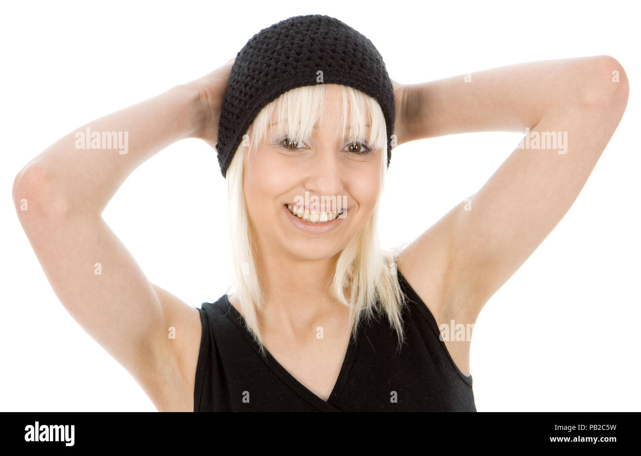 Beautyfully woman with black cap posing and smiling Stock Photo - Alamy