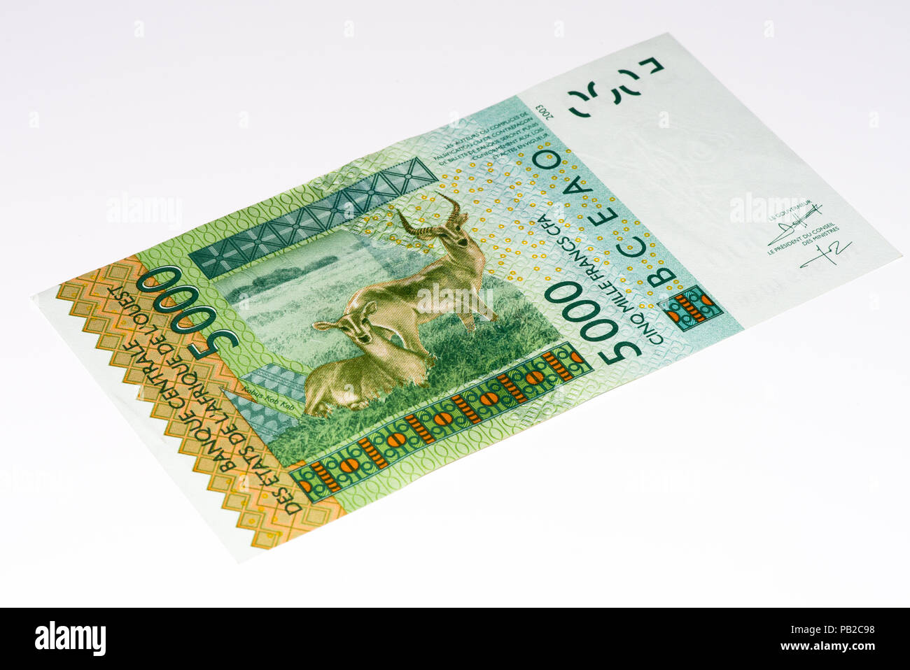 5000 CFA franc bank note. CFA franc is used in 14 African countries ...