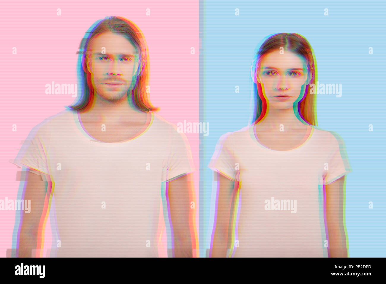 Confident young couple wearing similar clothes and standing against the ...