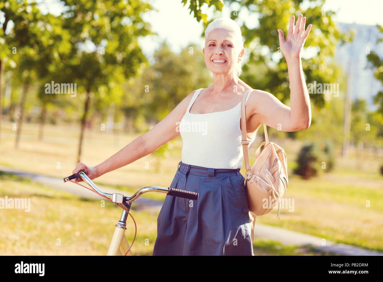 Mature lady waving hi-res stock photography and images - Alamy