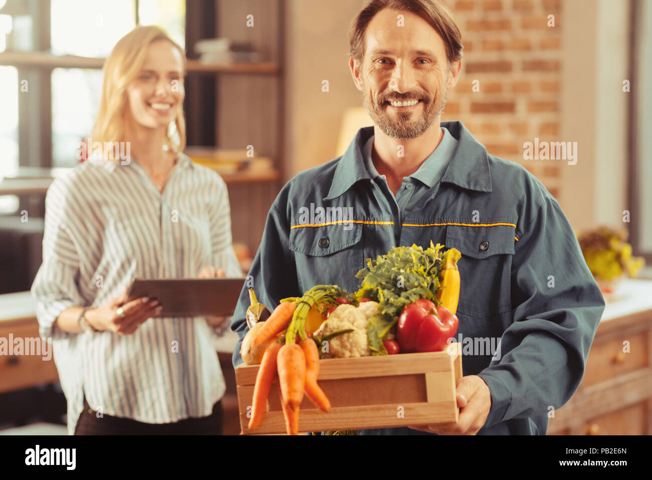 Silhouette of smiling client that standing on the background Stock ...