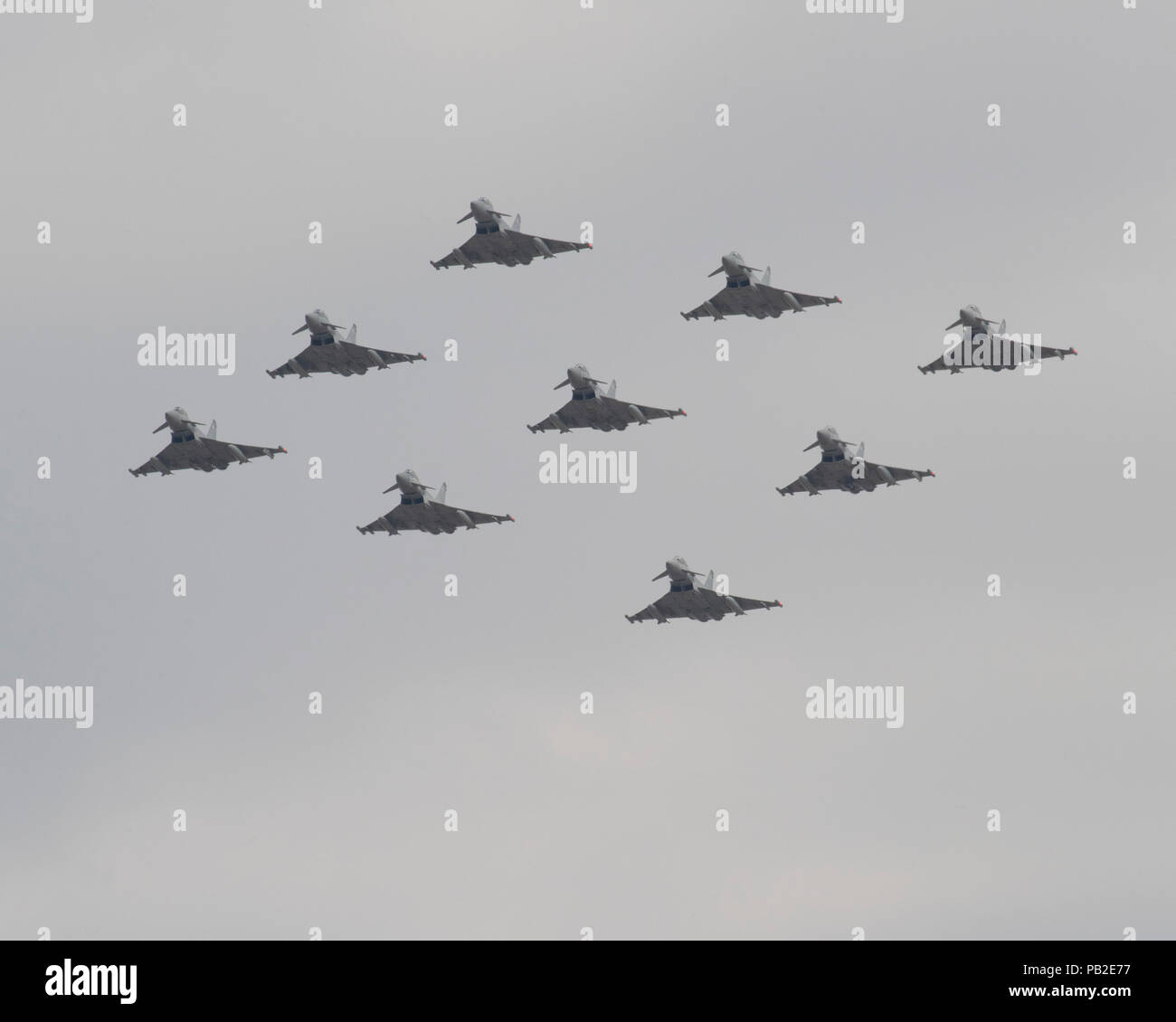 Nine RAF Typhoon jet fighters flypast in a diamond formation at the ...