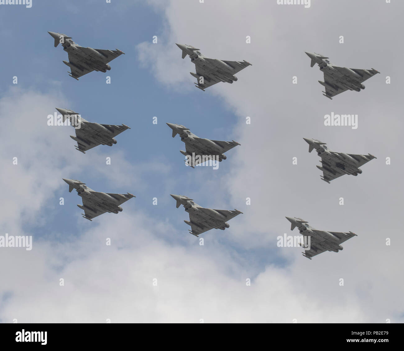 Nine RAF Typhoon jet fighters flypast in a diamond formation at the ...