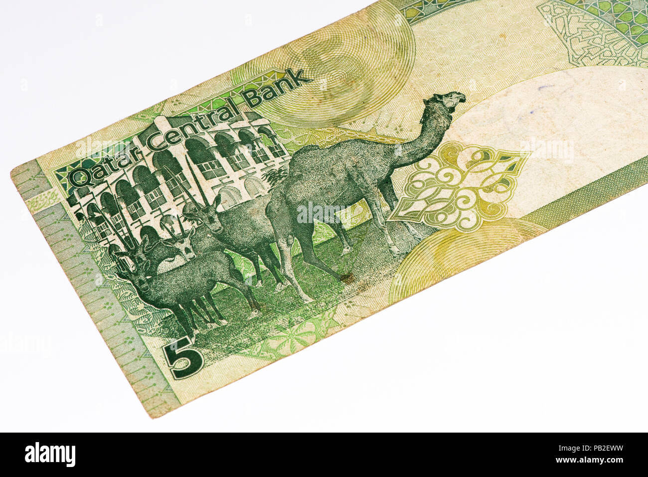 5 Qatari riyal bank note. Riyal is the national currency of Qatar Stock ...