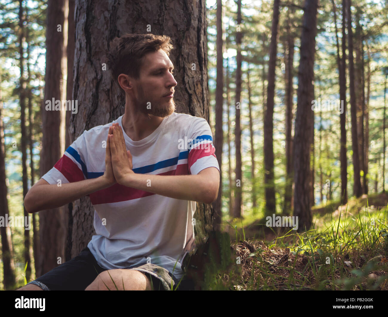 Meditate relax tree under one hi-res stock photography and images - Alamy