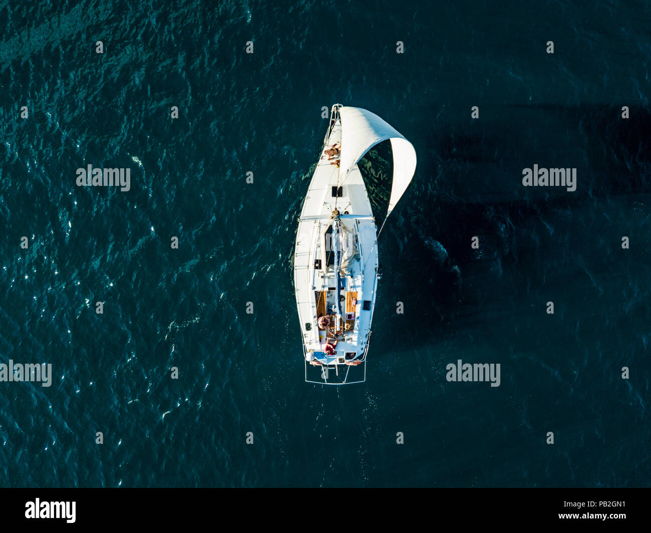 aerial photo of sailboat yacht top view, isolated on the sea texture ...