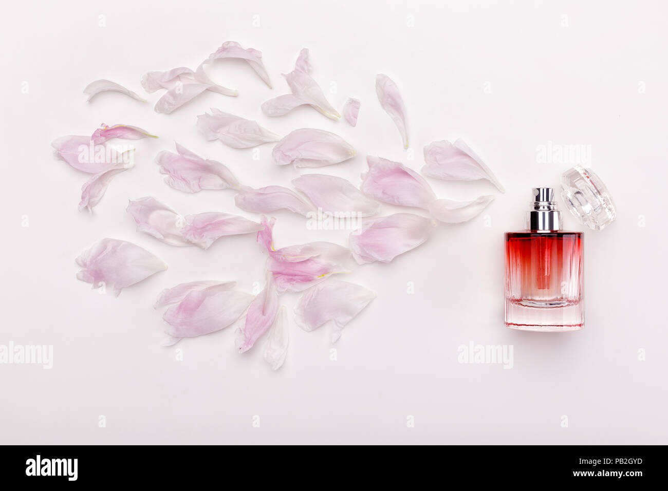 perfume and flower petals top view Stock Photo - Alamy