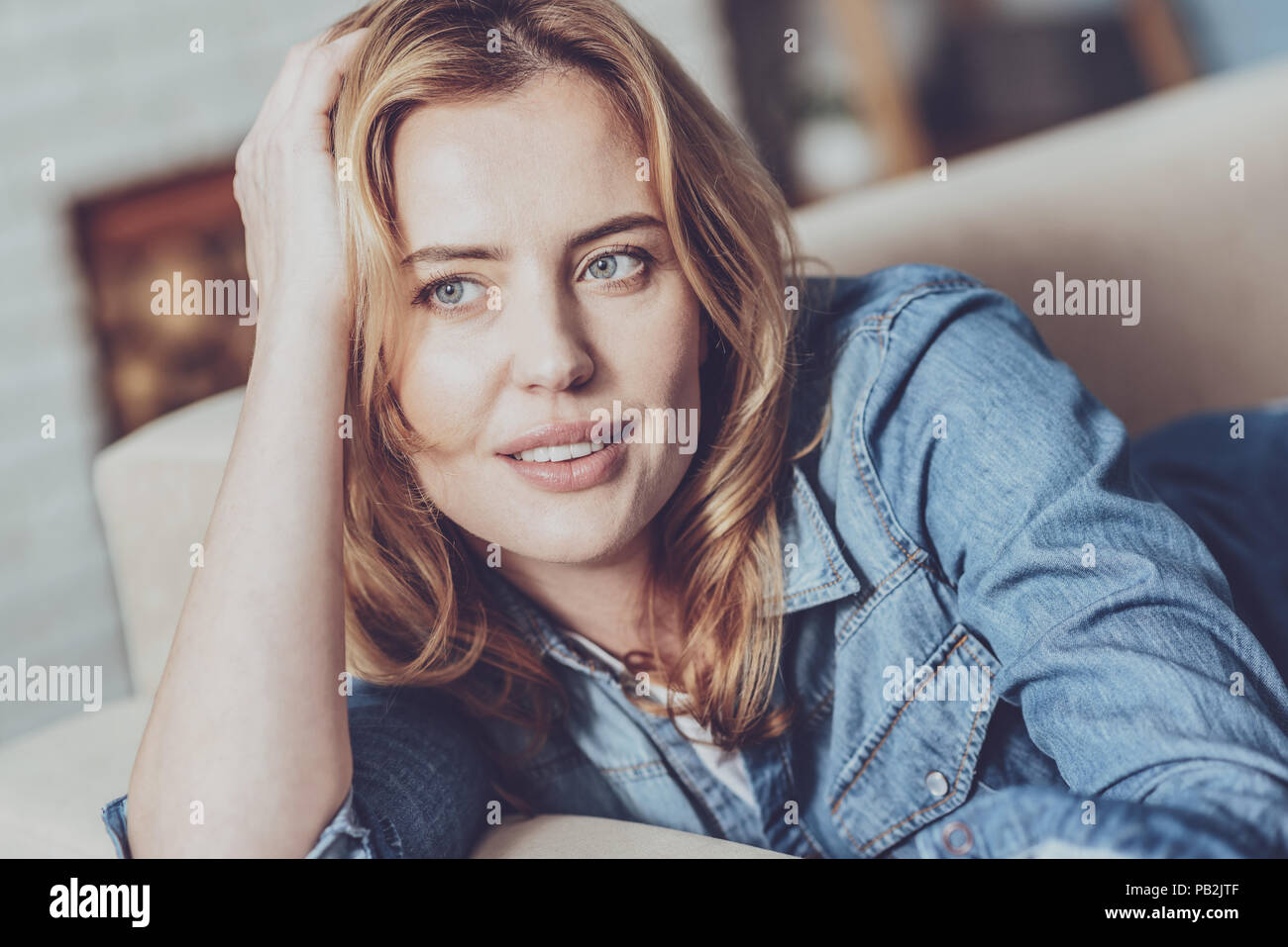Portrait of relaxed female that being deep in thoughts Stock Photo - Alamy