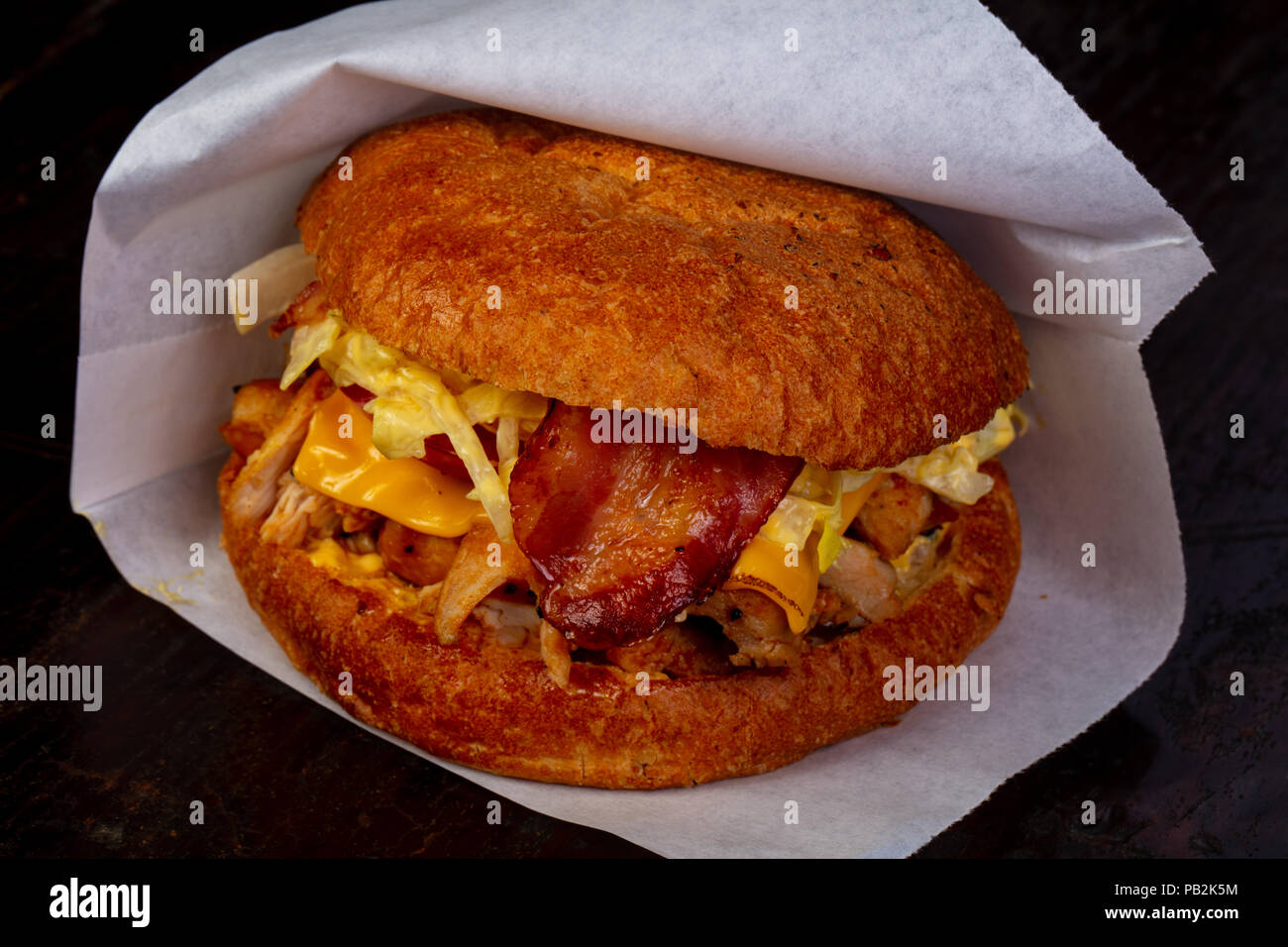 Bugrer with chicken and bacon Stock Photo - Alamy