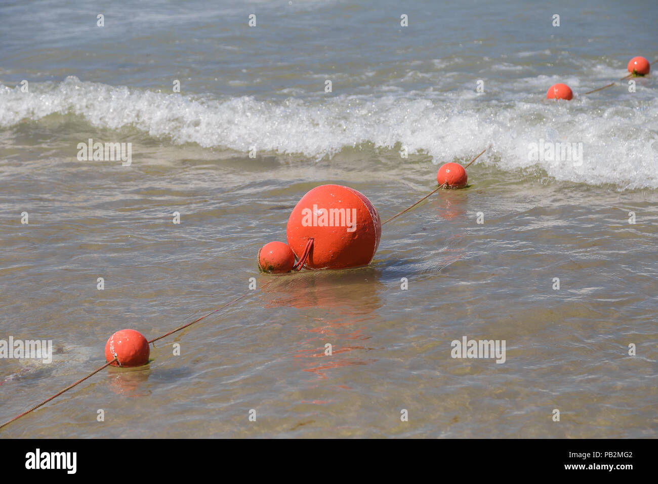 Red surface marker buoys hi-res stock photography and images - Alamy