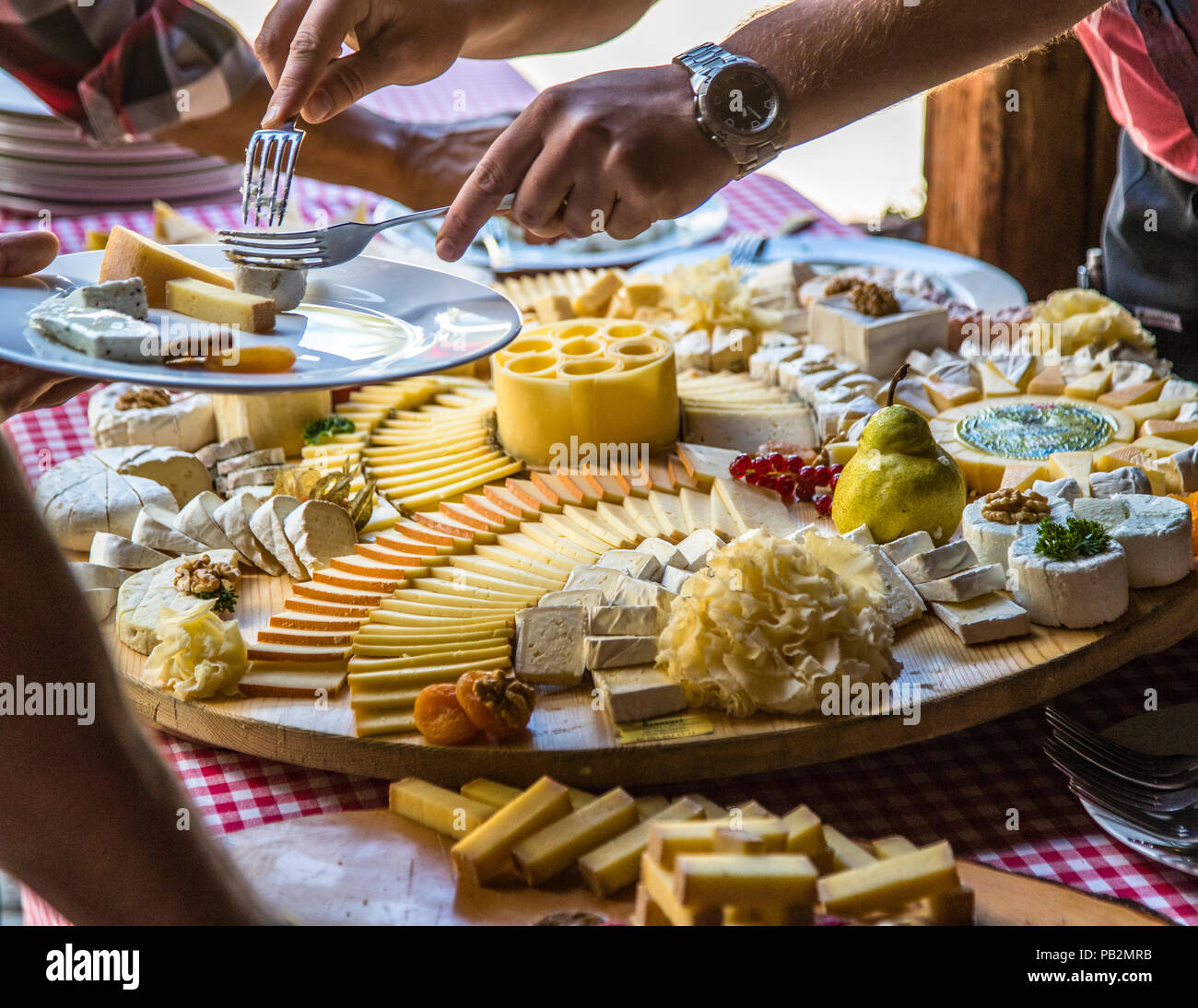 Cheese Platter at Alpine Cheese Dairy Morteratsch Stock Photo - Alamy