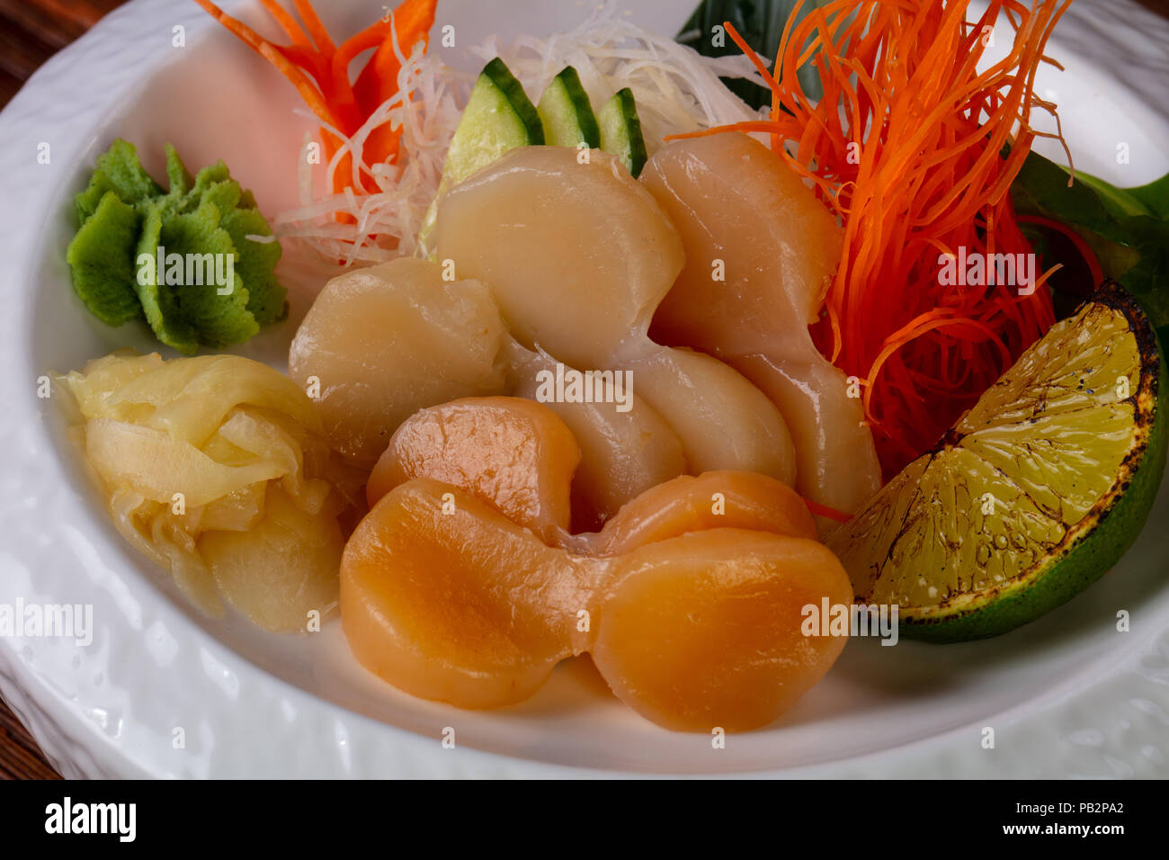 Japanese sashimi scallops served hi-res stock photography and images ...