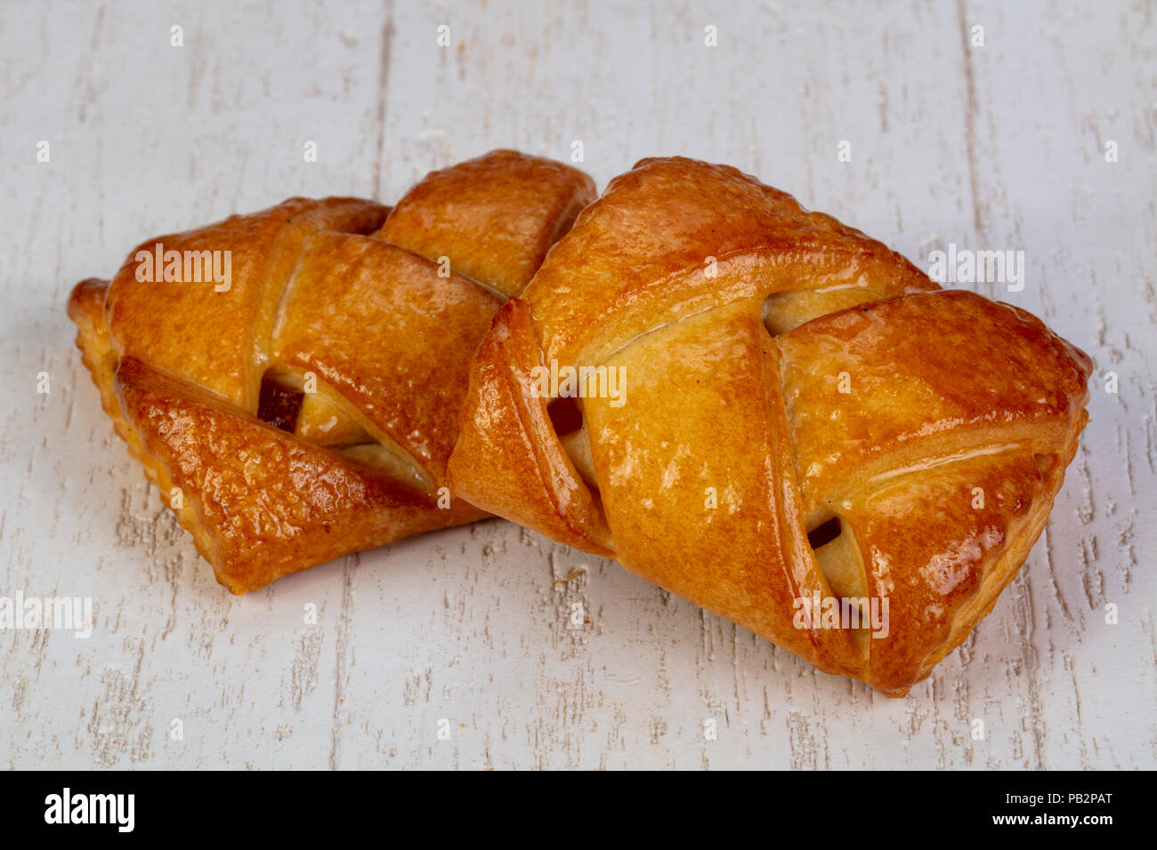 Delicious puff pastry strudel with jam Stock Photo - Alamy