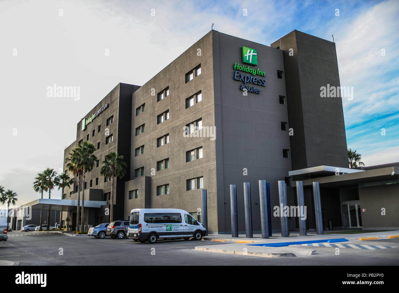 new attractively painted & landscaped cheerful midsize Holiday Inn ...