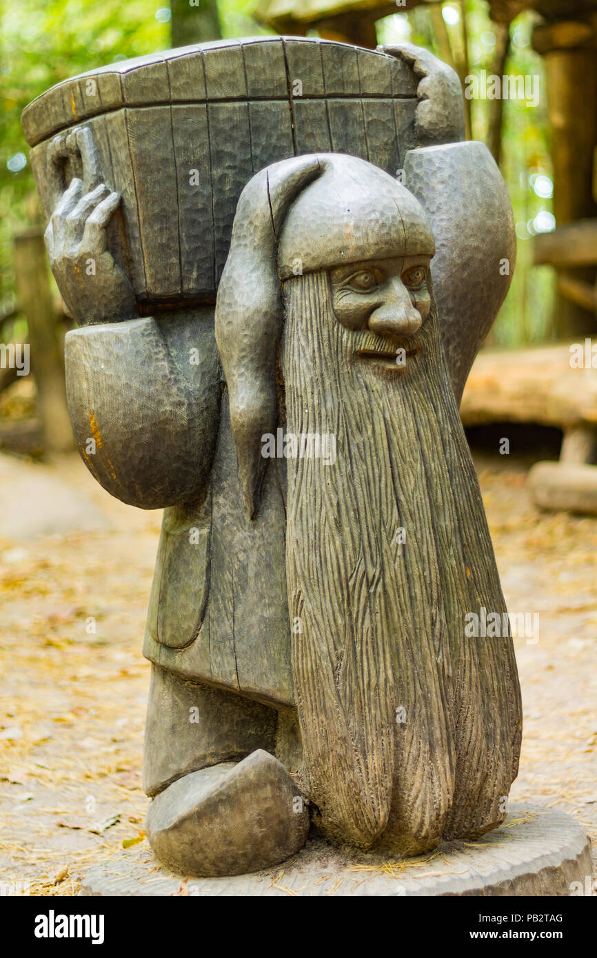 Wood carved tree human face hi-res stock photography and images - Alamy
