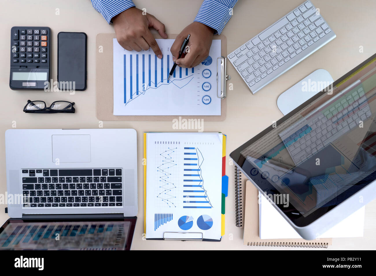 teamwork reports accounting concept analyzing financial Stock Photo - Alamy