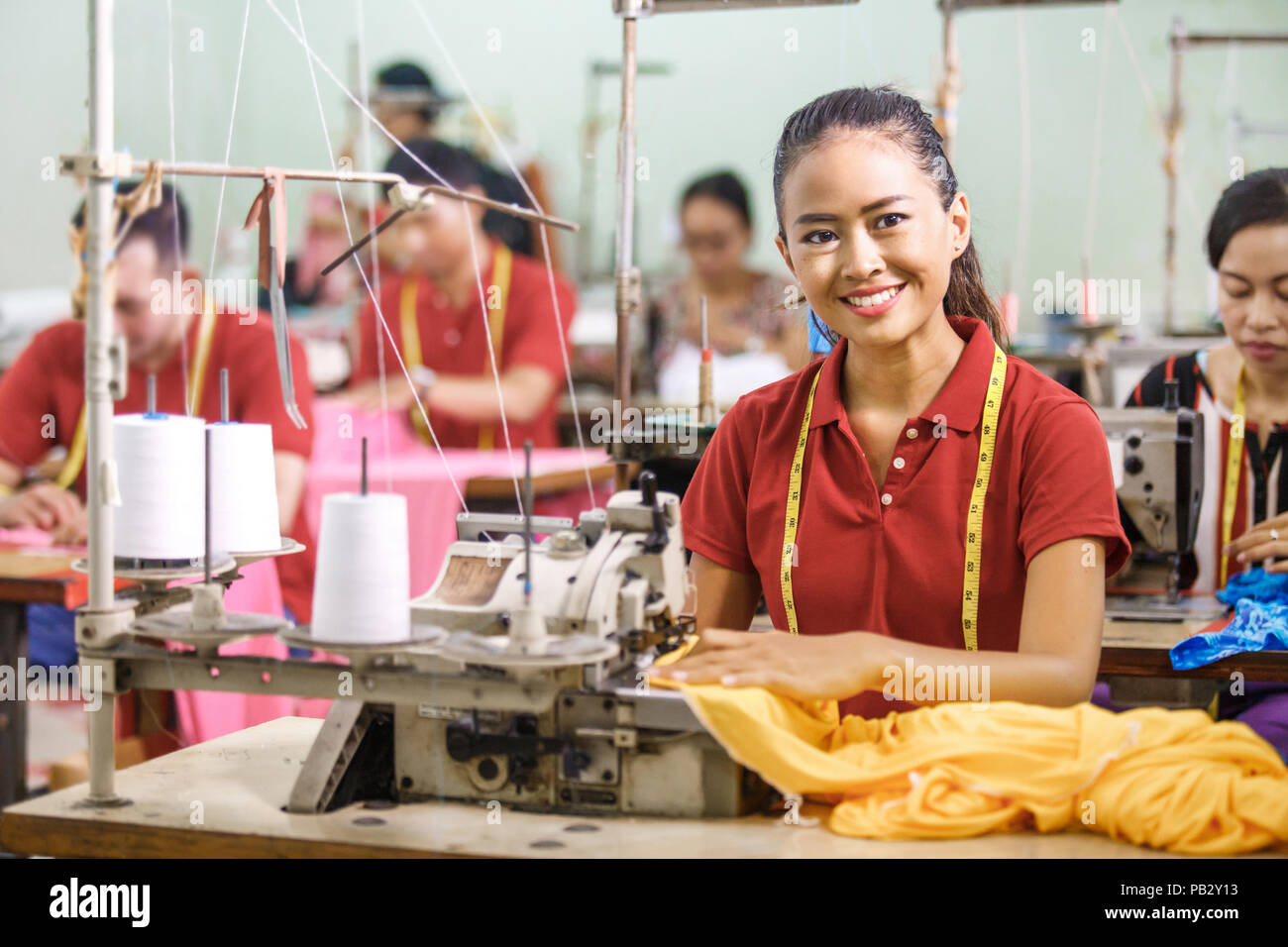 Woman clothes factory sewer hi-res stock photography and images - Alamy
