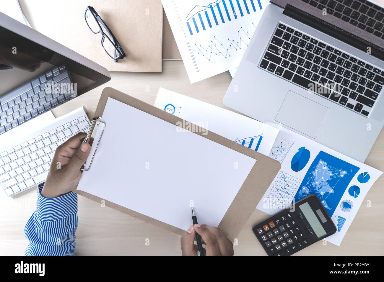 analyzing the work Accounting on Laptop investment concept Stock Photo ...