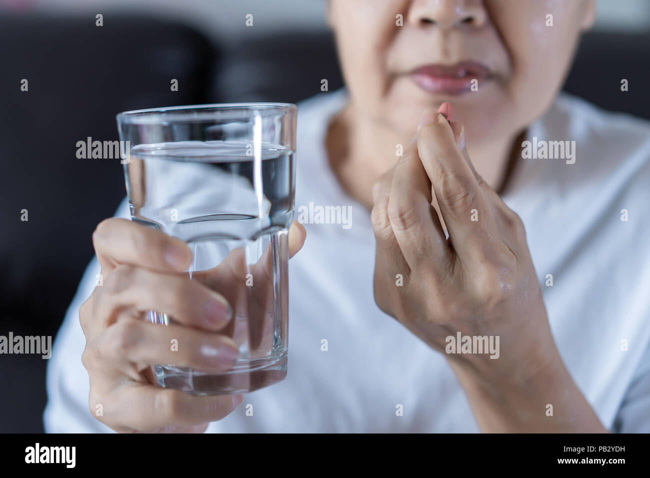 elderly woman eat drug Medicine eating healthy medicine Stock Photo - Alamy