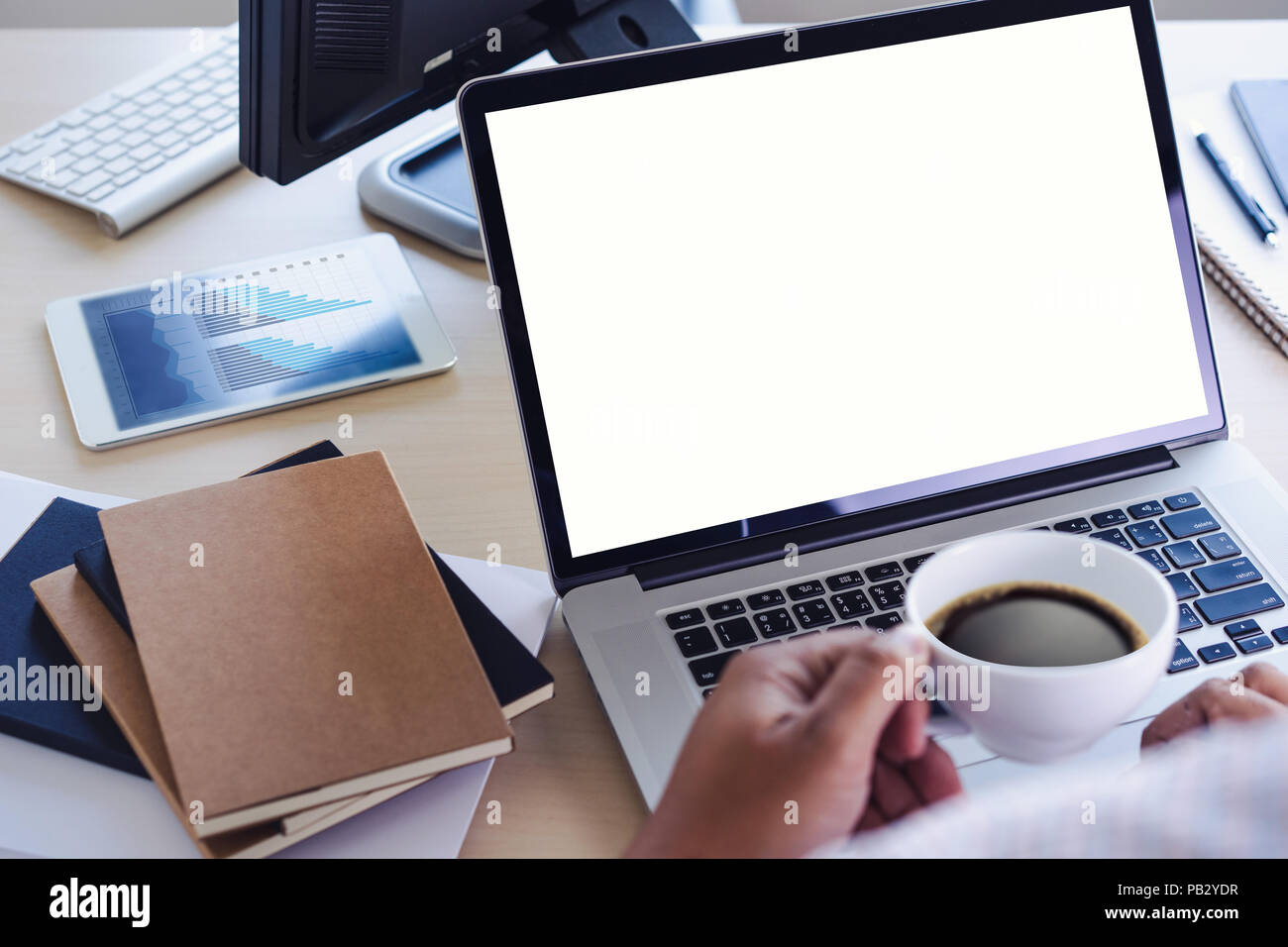 man of business man hand working on laptop computer blank white screen ...