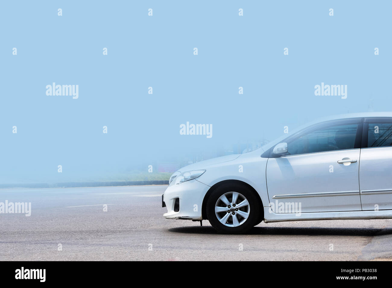 White car on road Stock Photo - Alamy