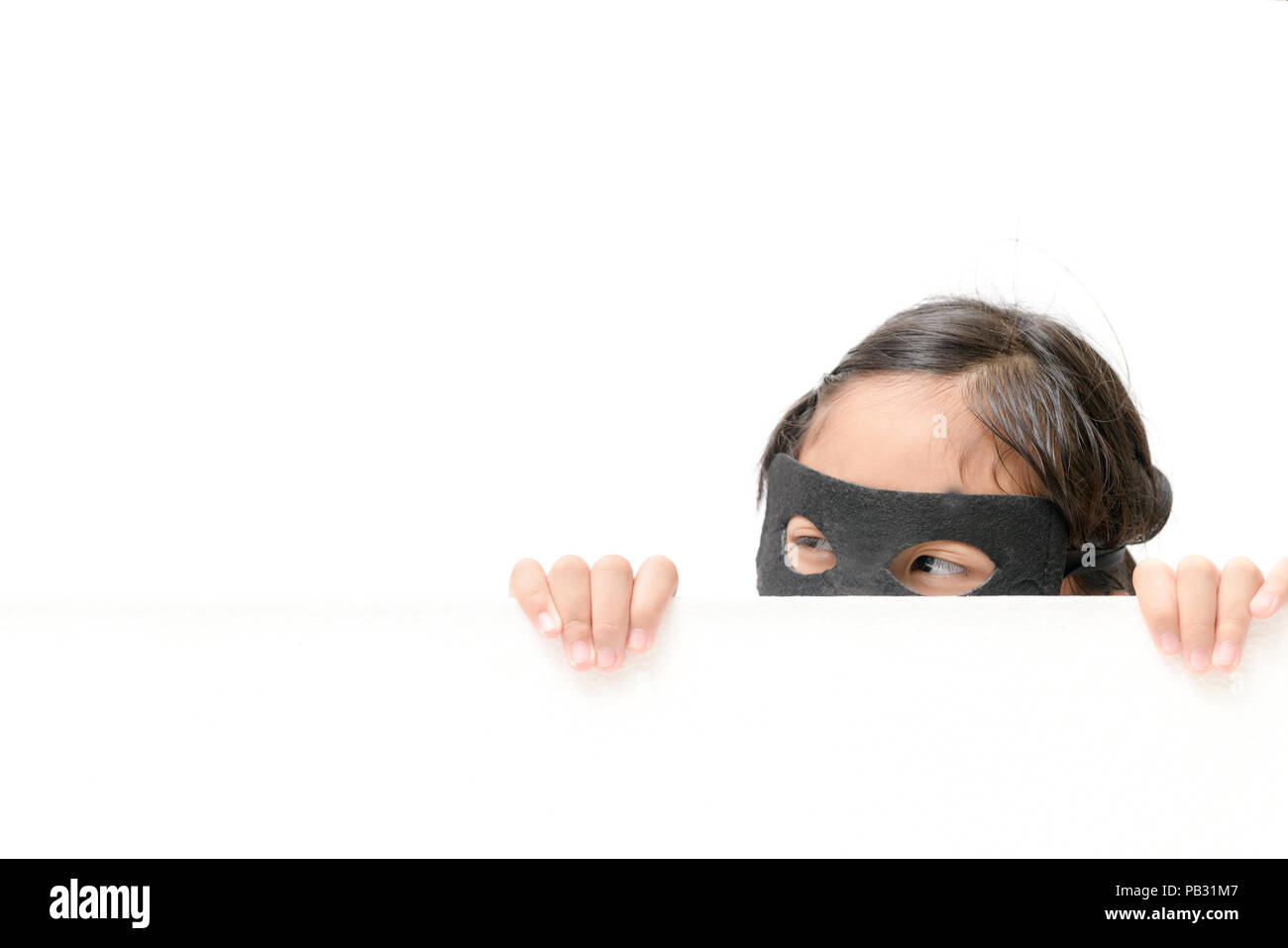 Superhero girl hide behind white banner board isolated on white ...