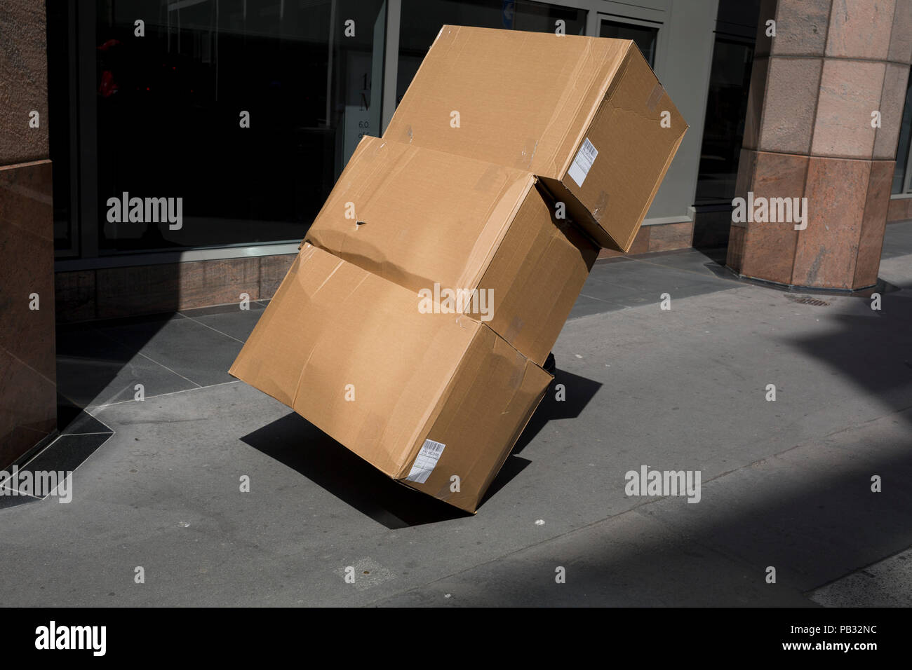 A delivery of large generic cardboard boxes in the City of London, the ...