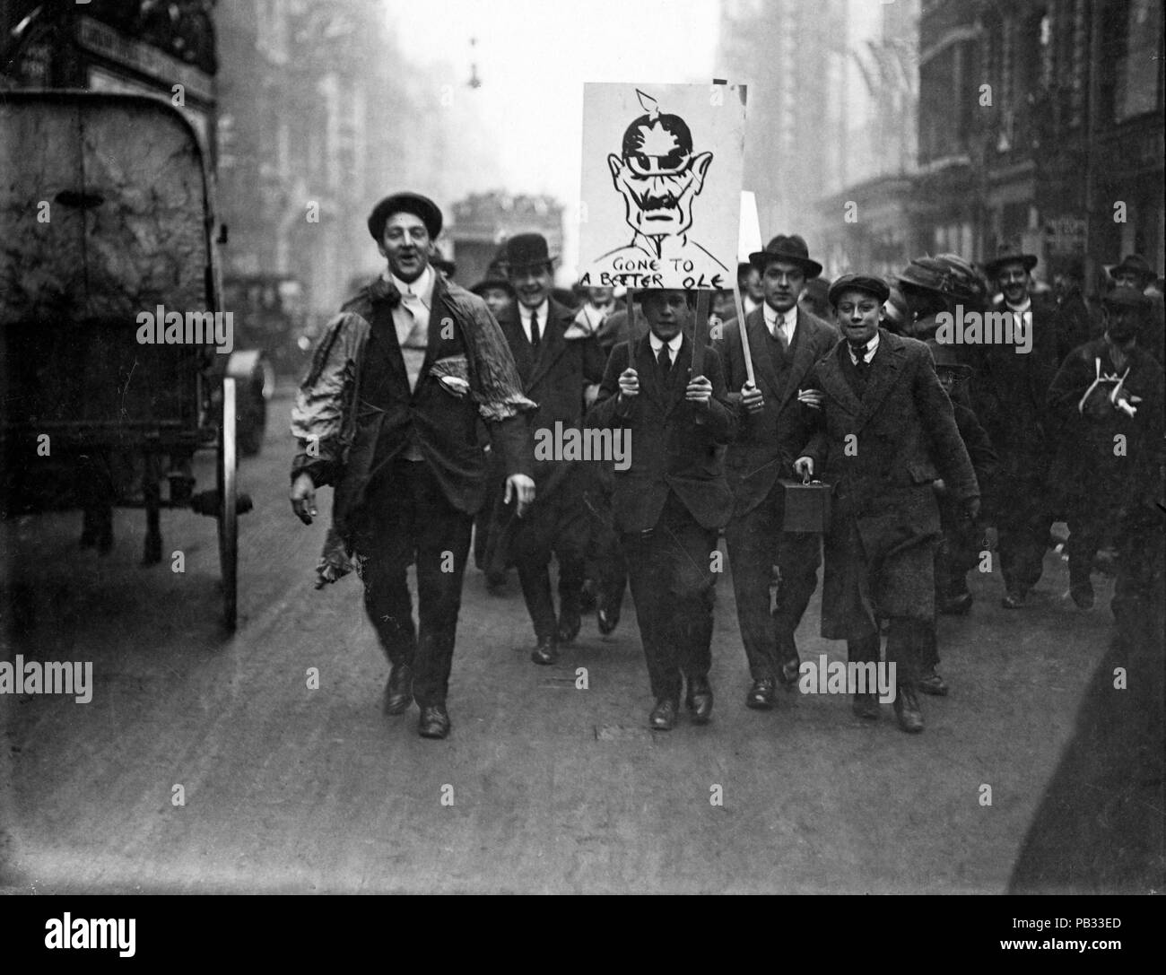 Official photograph showing men celebrating victory as part of a parade ...