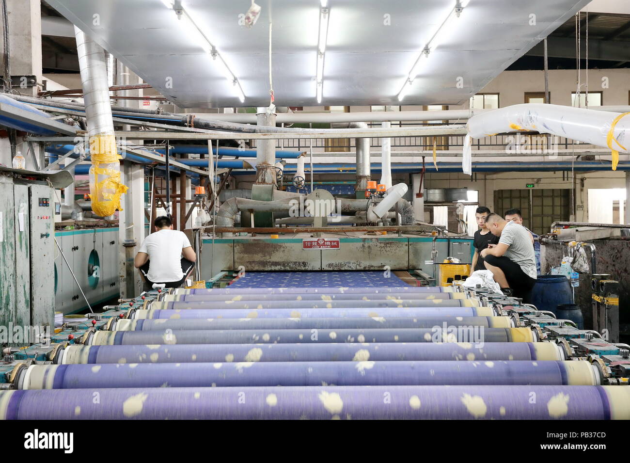 Nanton, Nanton, China. 26th July, 2018. Nantong, CHINA-Workers at a ...