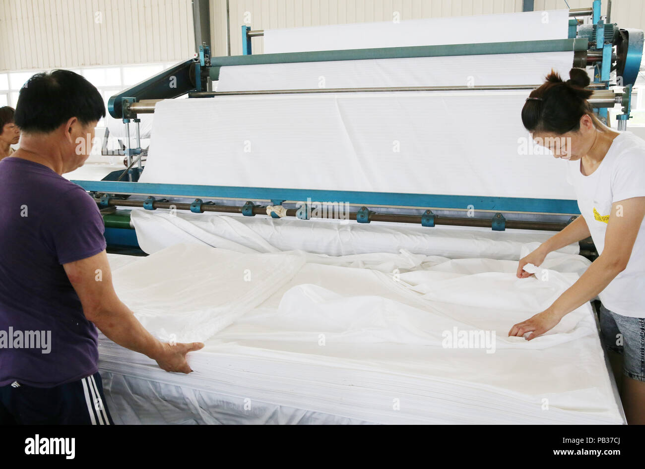 Nanton, Nanton, China. 26th July, 2018. Nantong, CHINA-Workers at a ...