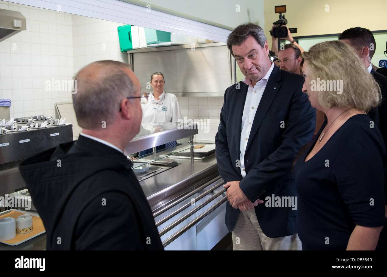 Munich, Germany. 26th July, 2018. Markus Soeder (C, CSU), Prime ...