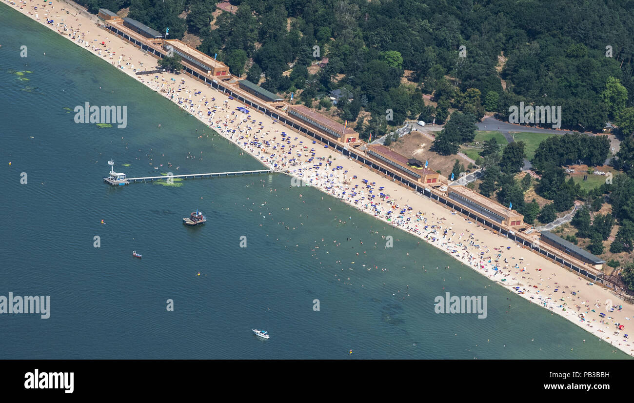 25 July 2018, Germany, Berlin: People enjoy the sun on the beach at ...